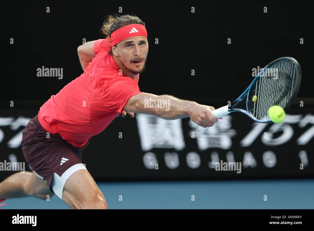 German tennis player Alexander Zverev playing backhand shot at Australian Open 2025 tournament ...