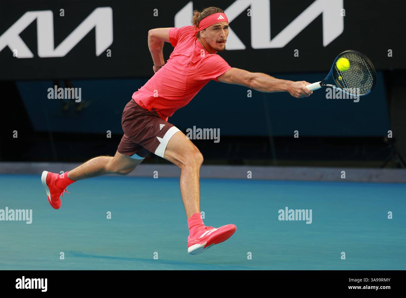 German tennis player Alexander Zverev playing backhand shot at Australian Open 2025 tournament ...