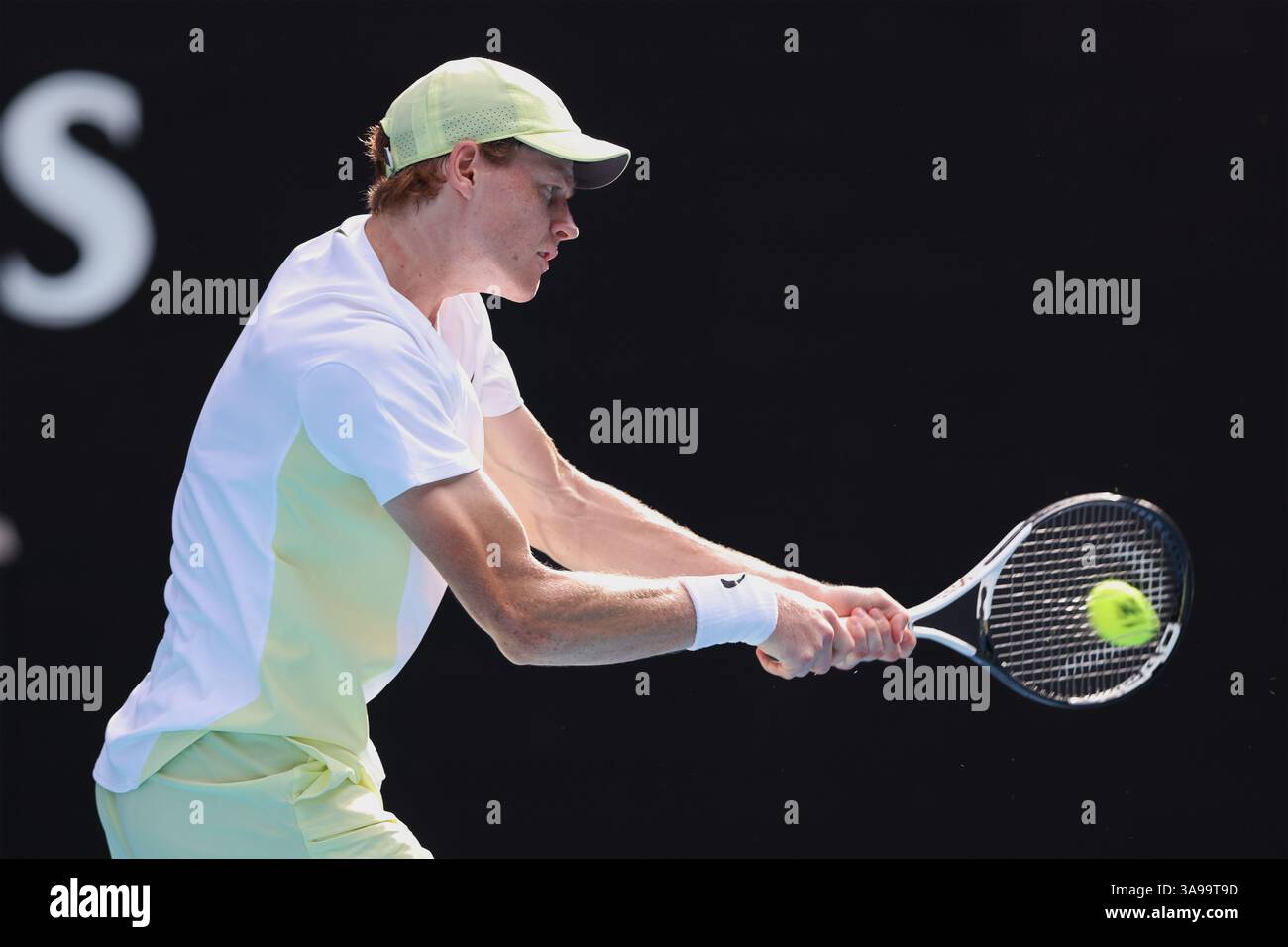 Italian tennis player Jannik Sinner (ITA) playing a backhand shot at ...