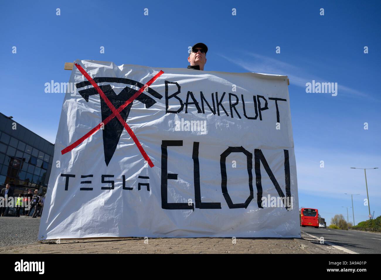Anti-Elon Musk protesters demonstrated outside the Tesla showroom in ...