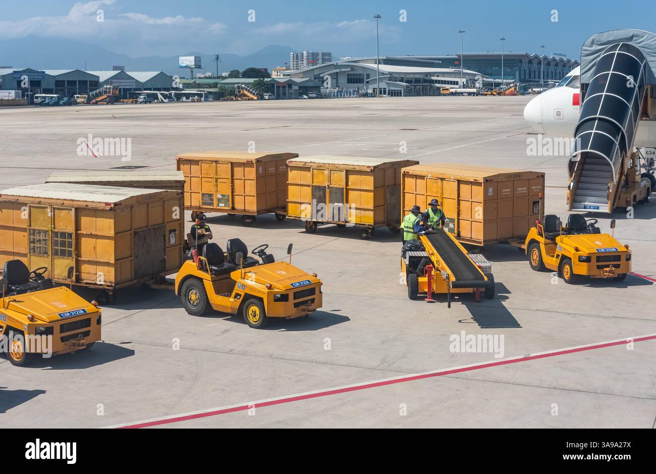 Cargo equipment car loader for luggage. Yellow car with luggage trailer ...