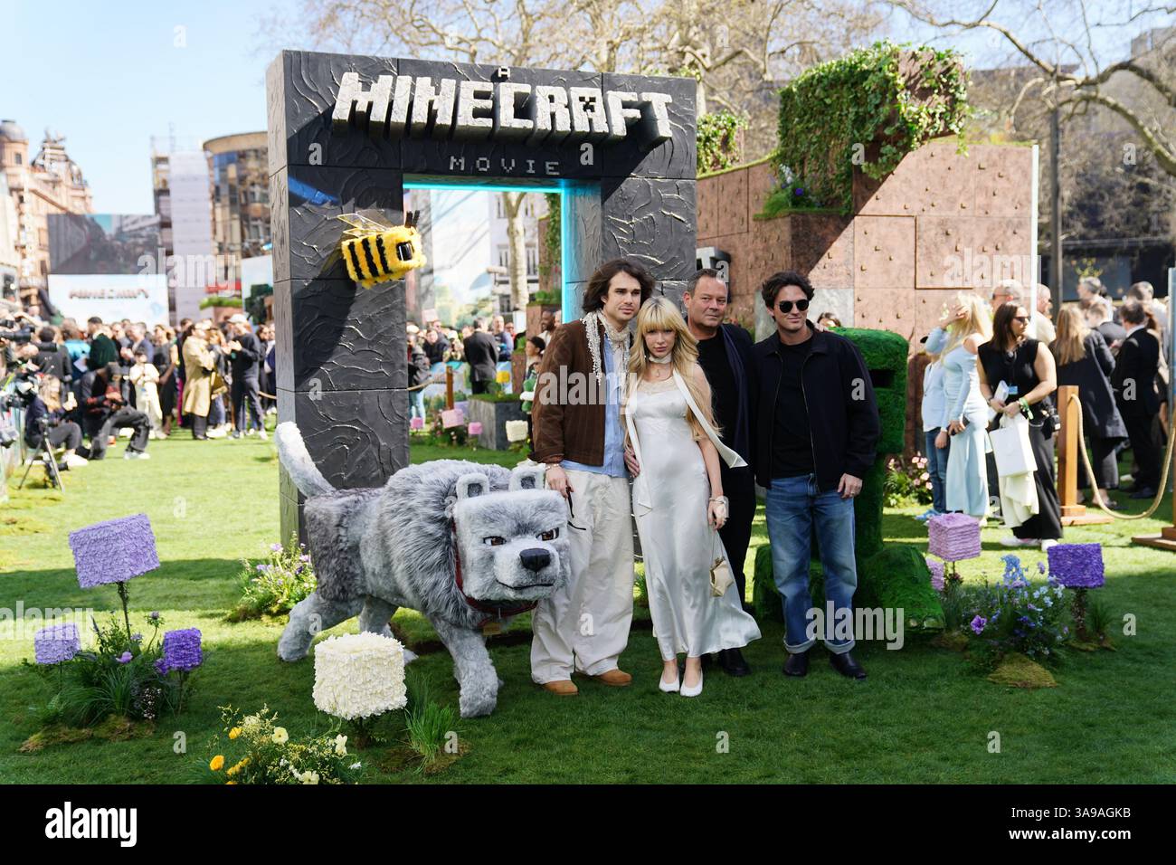Producer Kevin J. Messick (second right) with guests attend the world ...