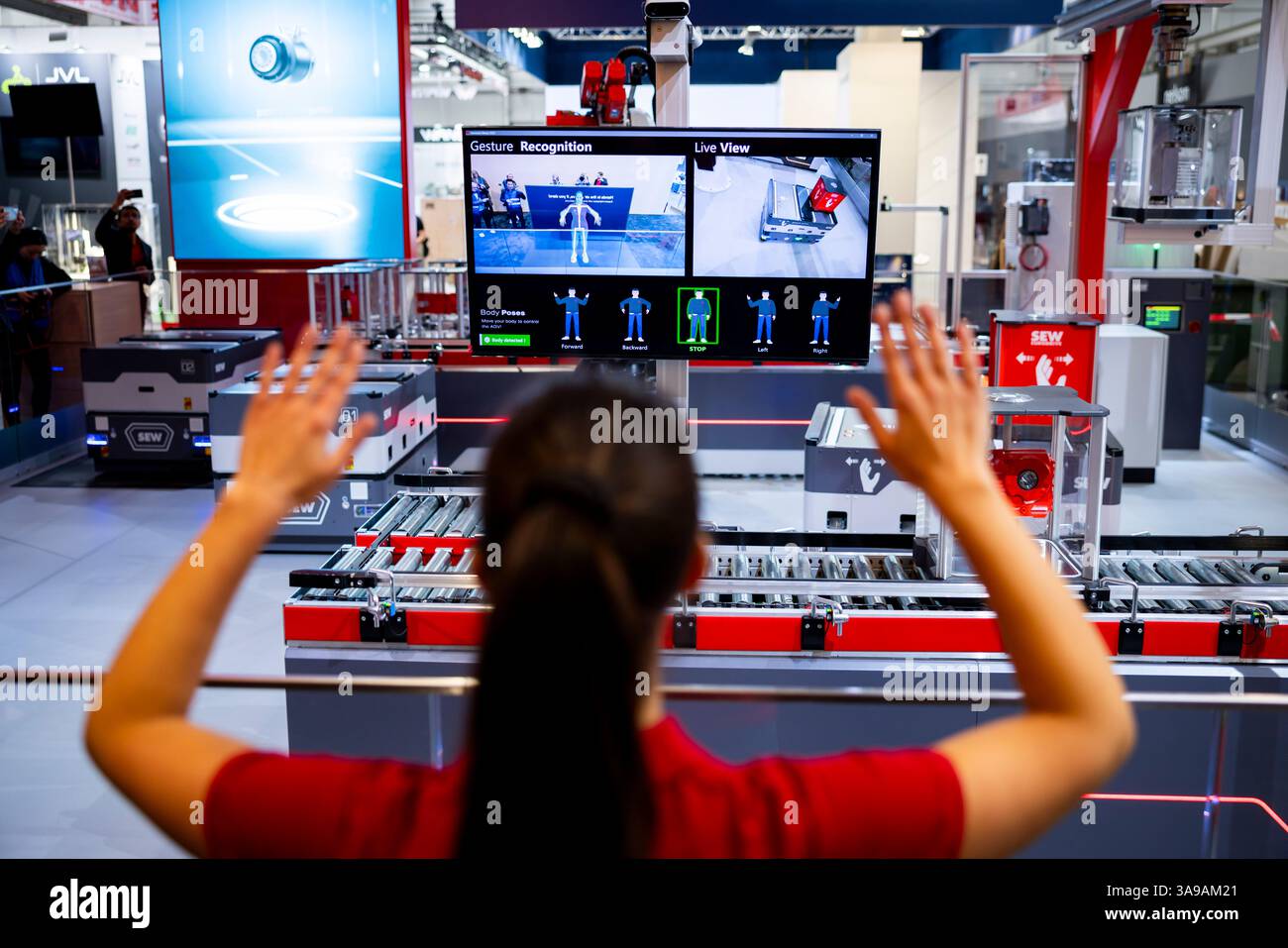 30 March 2025, Lower Saxony, Hanover: An employee demonstrates a ...