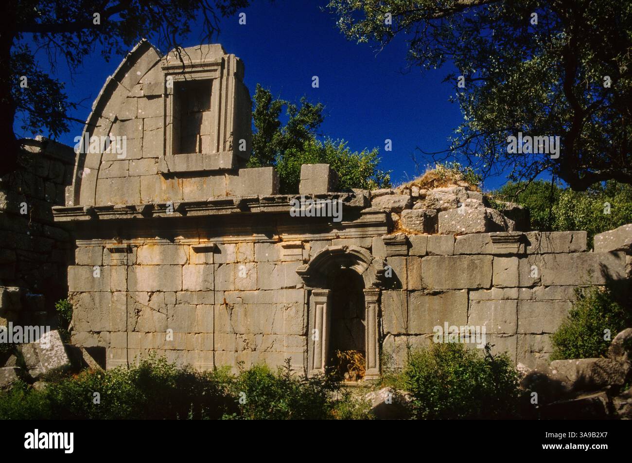Leaning columns and cracked and crumbling masonry on facade, shattered ...
