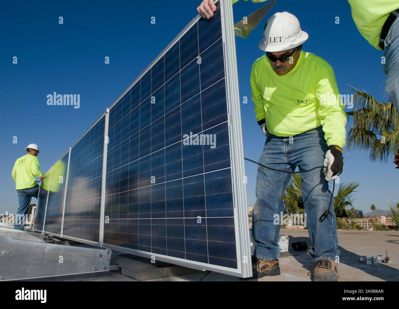 Lafferty Electric Technologies technician JOSE ZAPATA connects wires ...