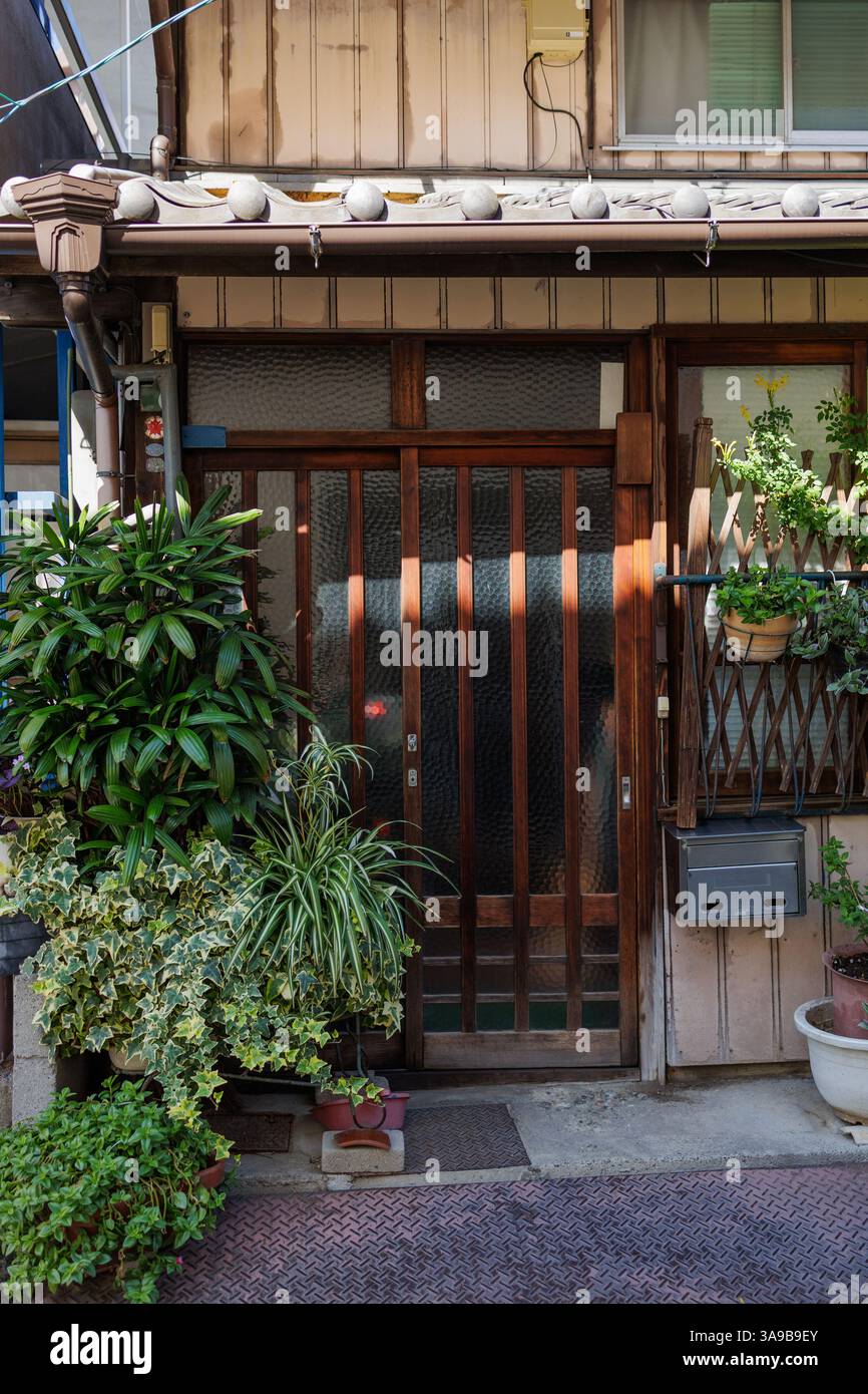 Built in the Showa era, traditional Japanese inner-city home features ...
