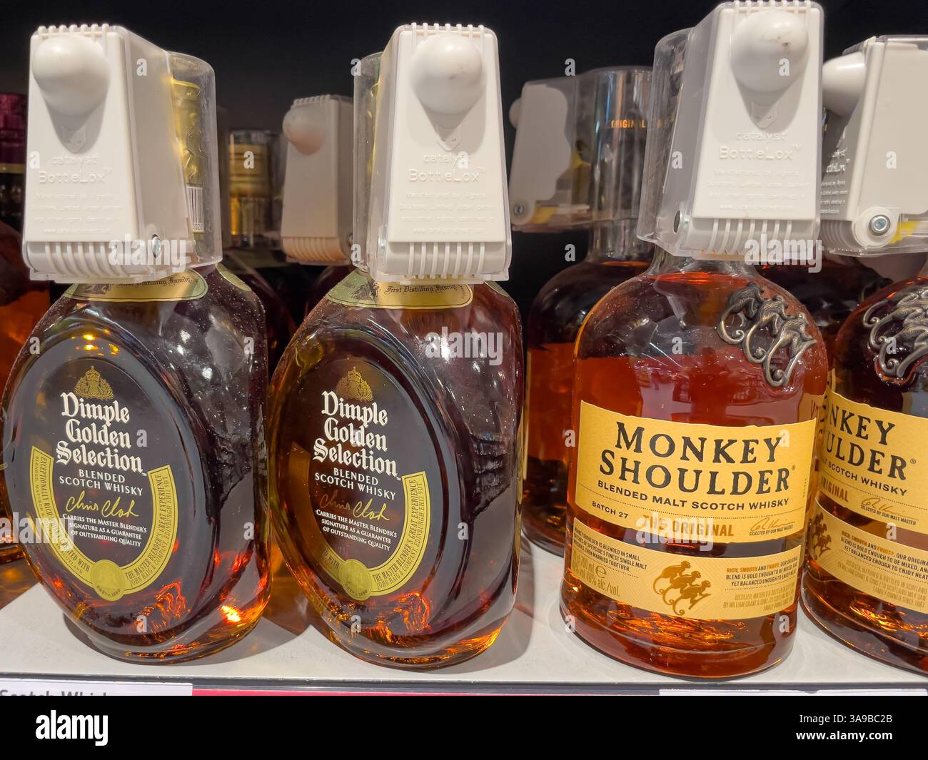Germany Berlin March 29, 2025. A row of bottles of Monkey Shoulder ...