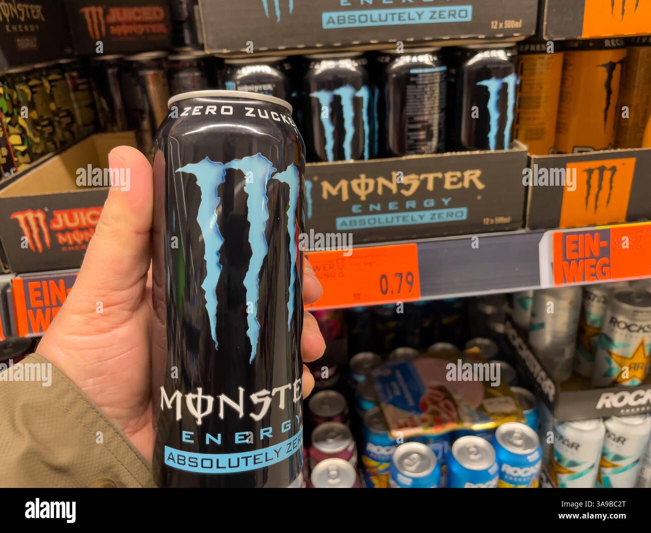 Germany Berlin March 29, 2025. A person is holding a Monster Energy ...