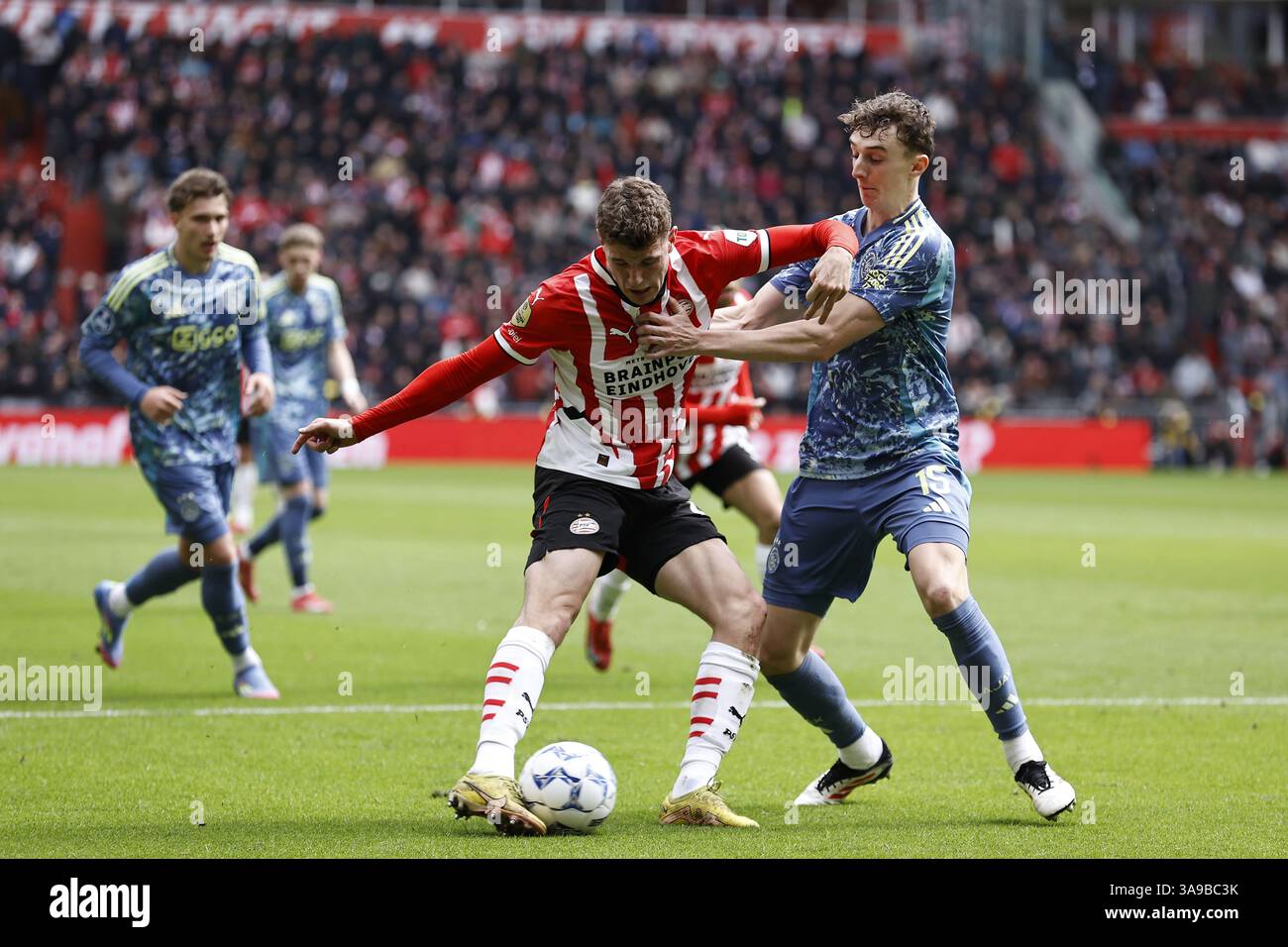 EINDHOVEN - (l-r) Guus Til of PSV Eindhoven, Youri Baas of Ajax during the Dutch Eredivisie ...