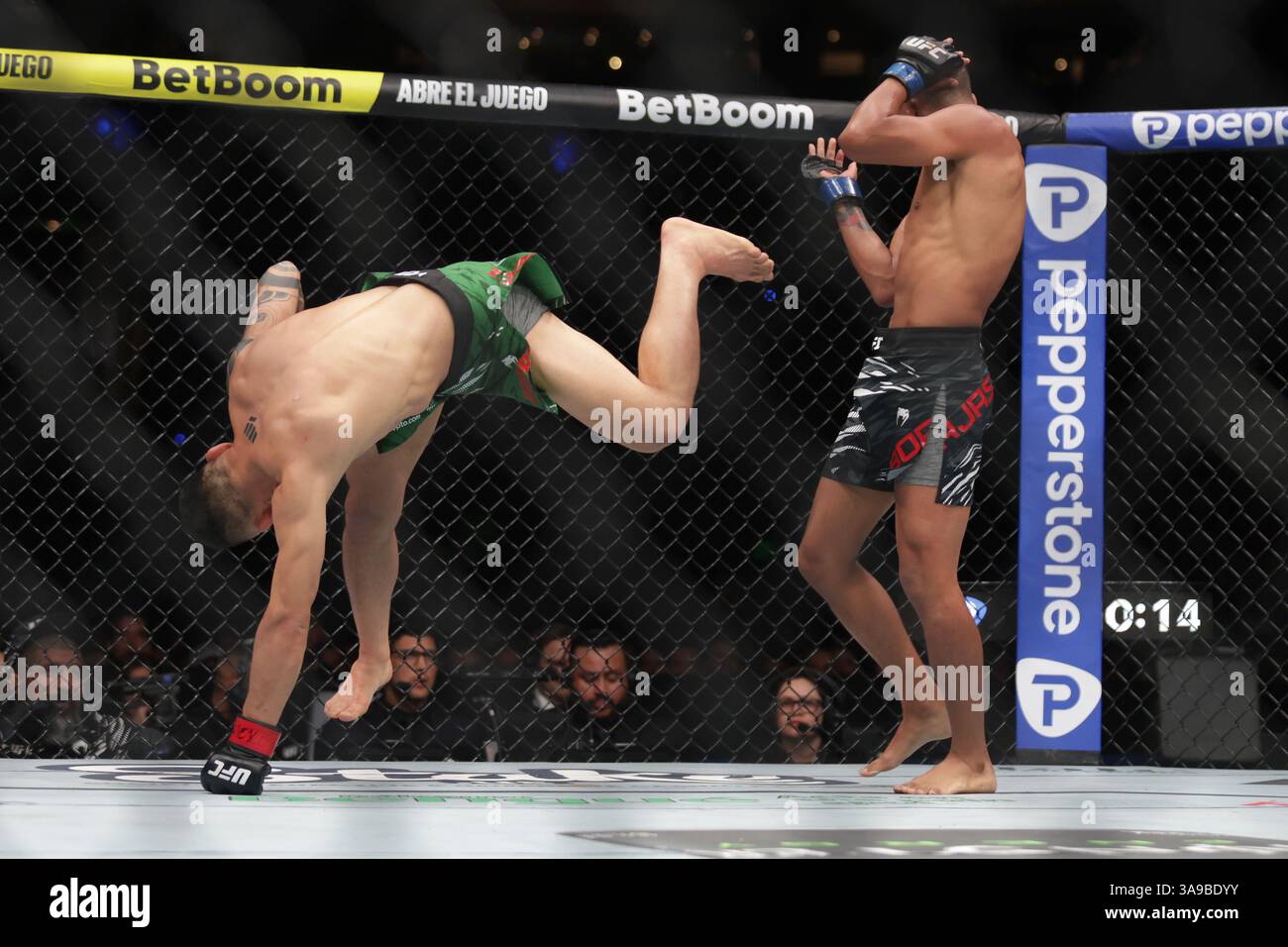 Ronaldo Rodriguez of Mexico (L) kicks Kevin Borjas of Peru (R) in a ...
