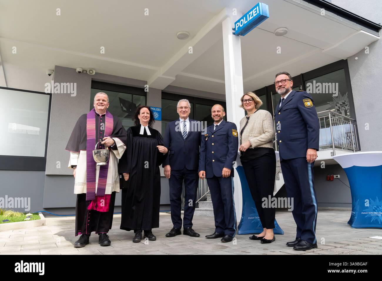 Augsburg, Bavaria, Germany - March 30, 2025: Clergymen with the Bavarian Minister of the ...