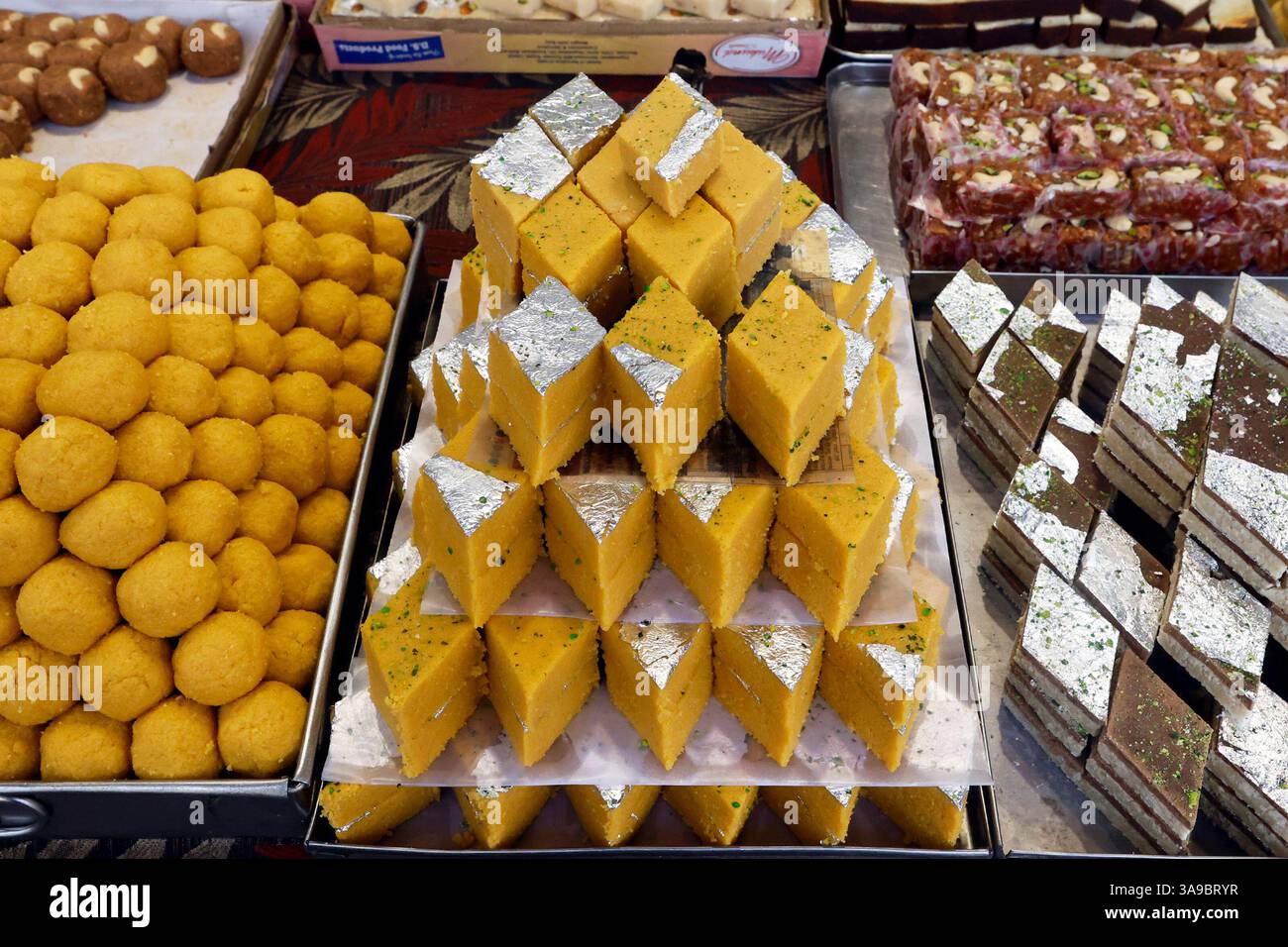 Sweets on display at a bakery in Kolkata, West Bengal, India Stock ...