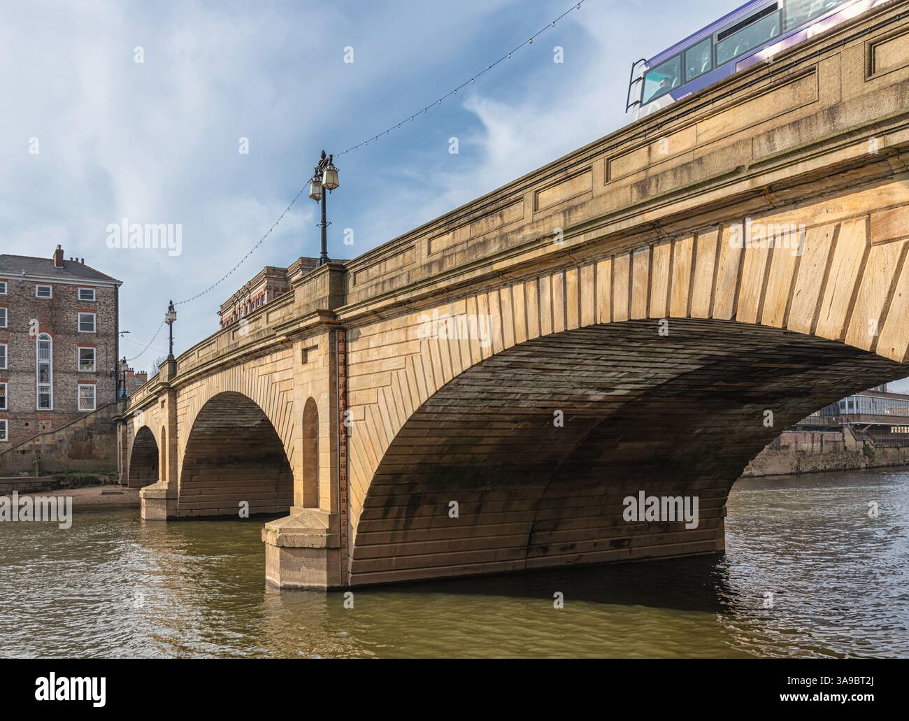 A close-up of the Ouse Bridge in York. The 19th stone structure leads ...