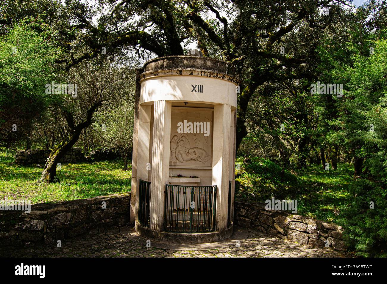 Fatima, Portugal - March 24, 2025: A peaceful stone shrine nestled ...