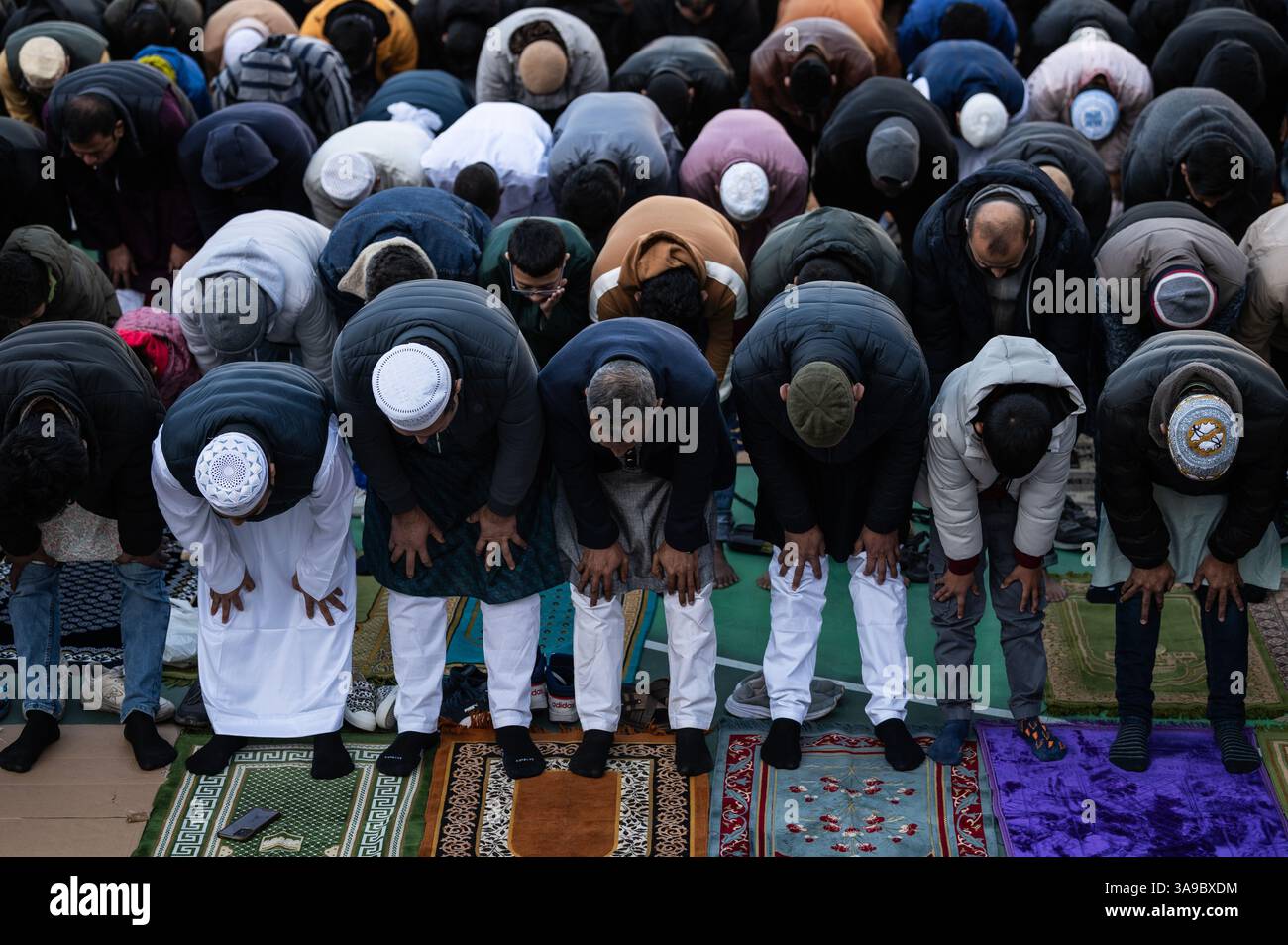Madrid, Spain. 30th Mar, 2025. Members of the Muslim community in ...