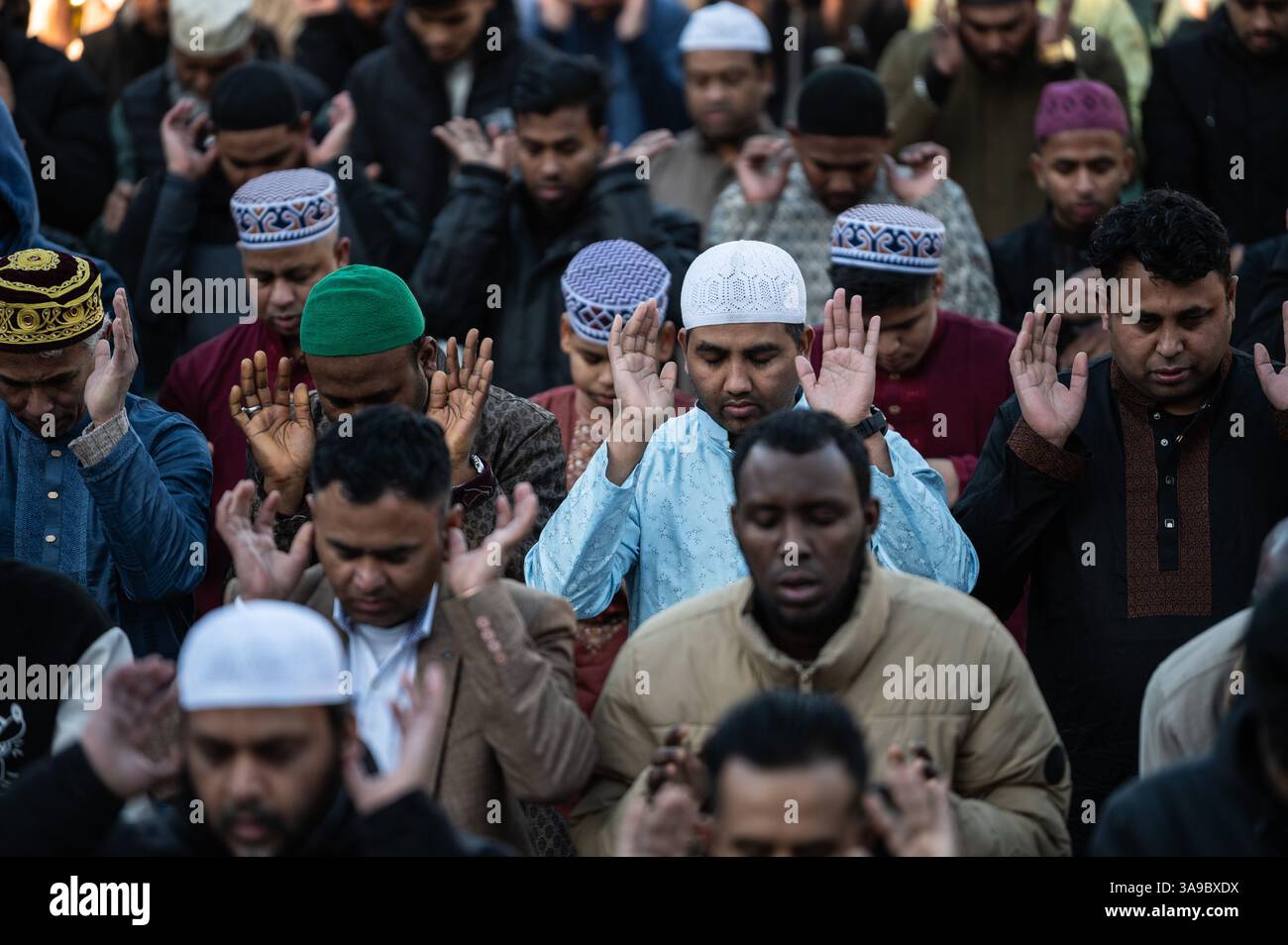 Madrid, Spain. 30th Mar, 2025. Members of the Muslim community in ...