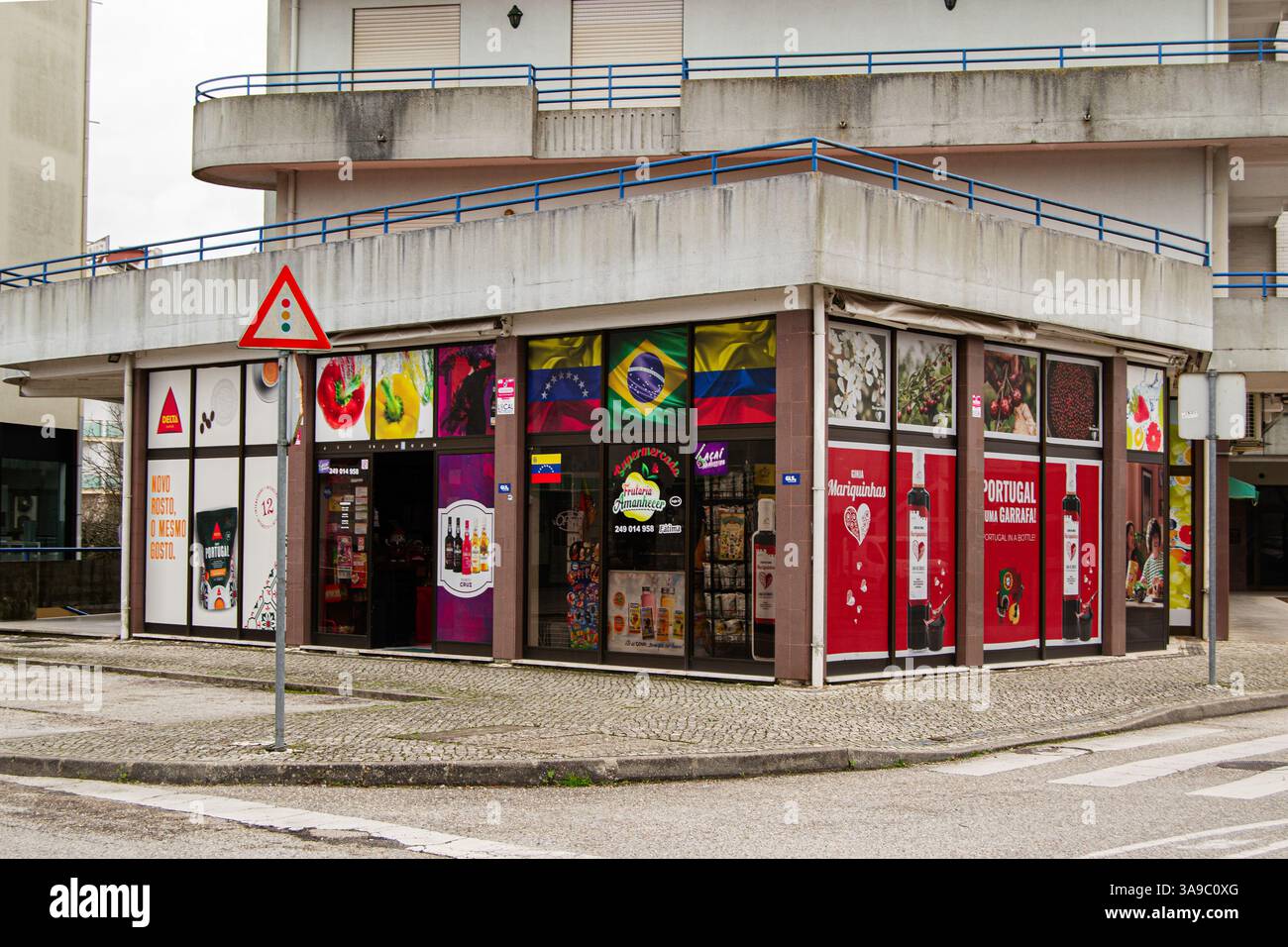 Fatima, Portugal - March 24, 2025: A vibrant corner grocery store with ...