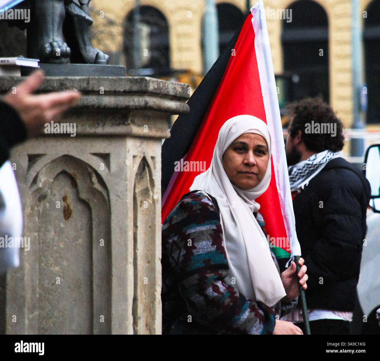 Prague, Czech Republic. 29th Mar, 2025. A woman holds a Palestinian ...