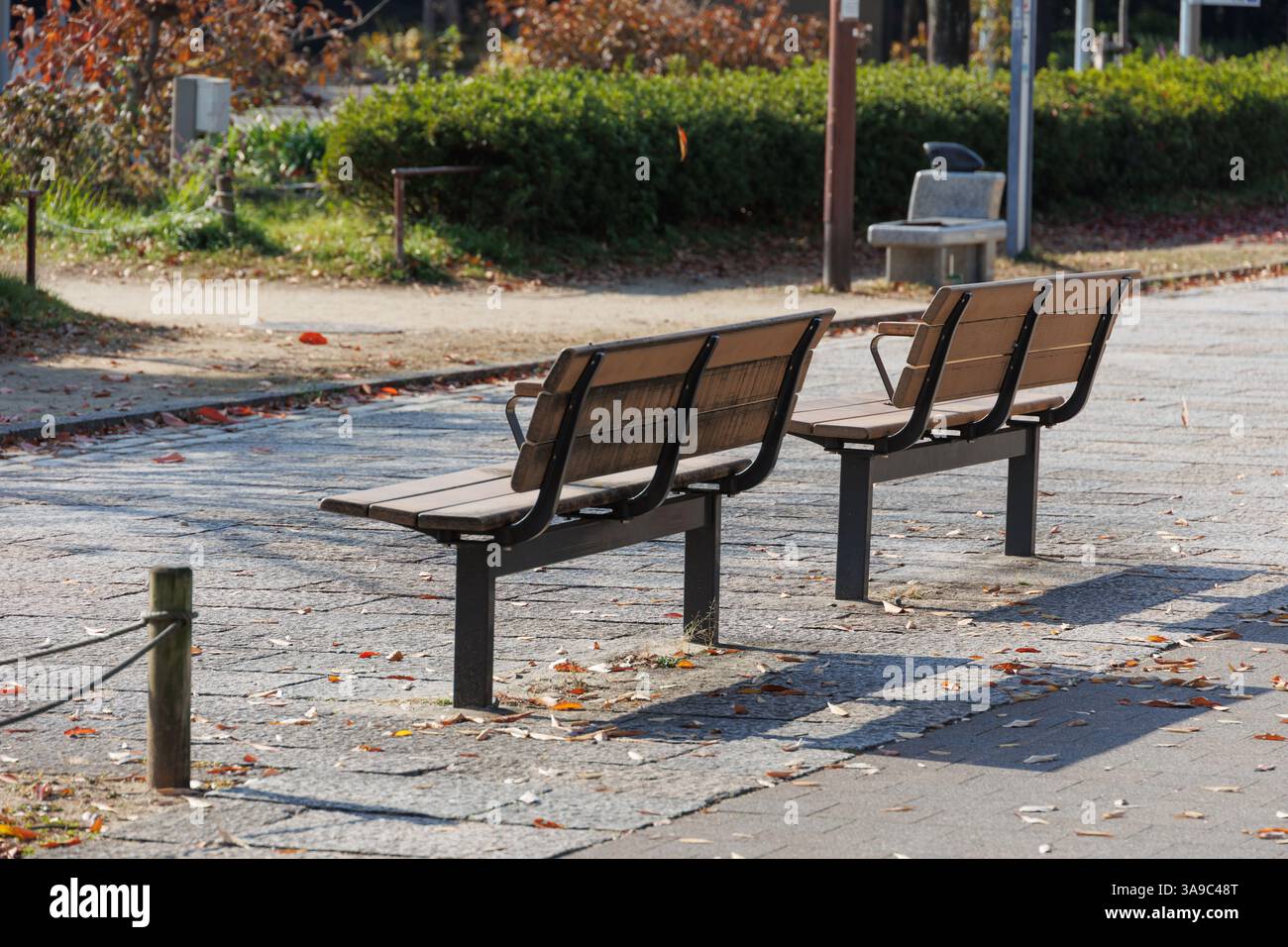 Bench in the public park, outdoors public area resting space empty ...