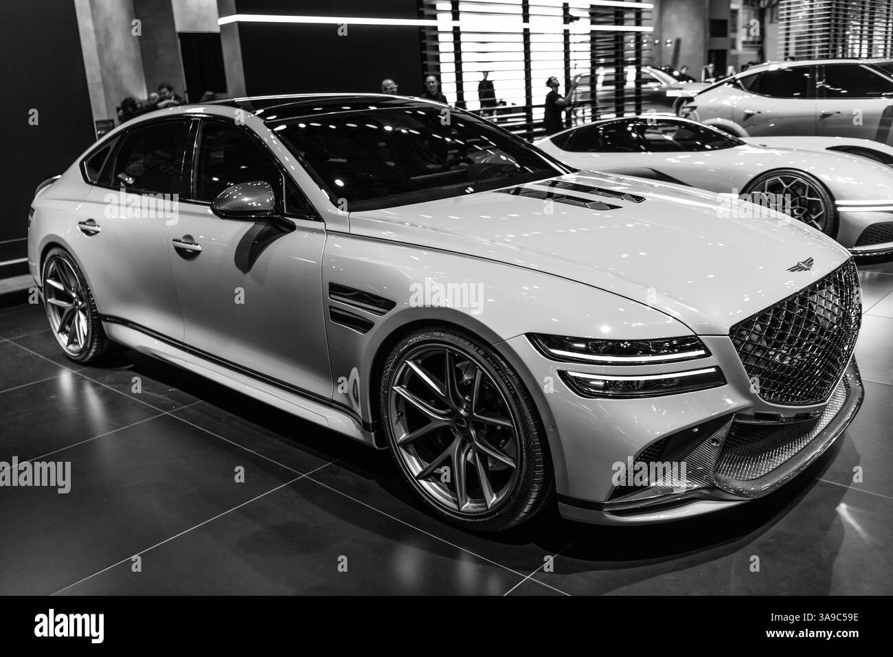 New York City, USA - March 27, 2024: Genesis G80 Magma Special luxury sportscar orange car at ...