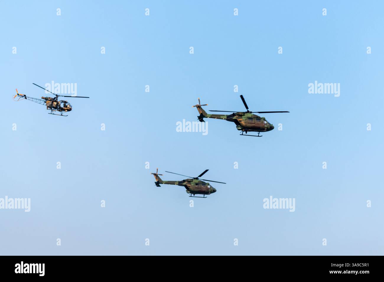 A group of helicopter in mid-air attack enemy Stock Photo - Alamy