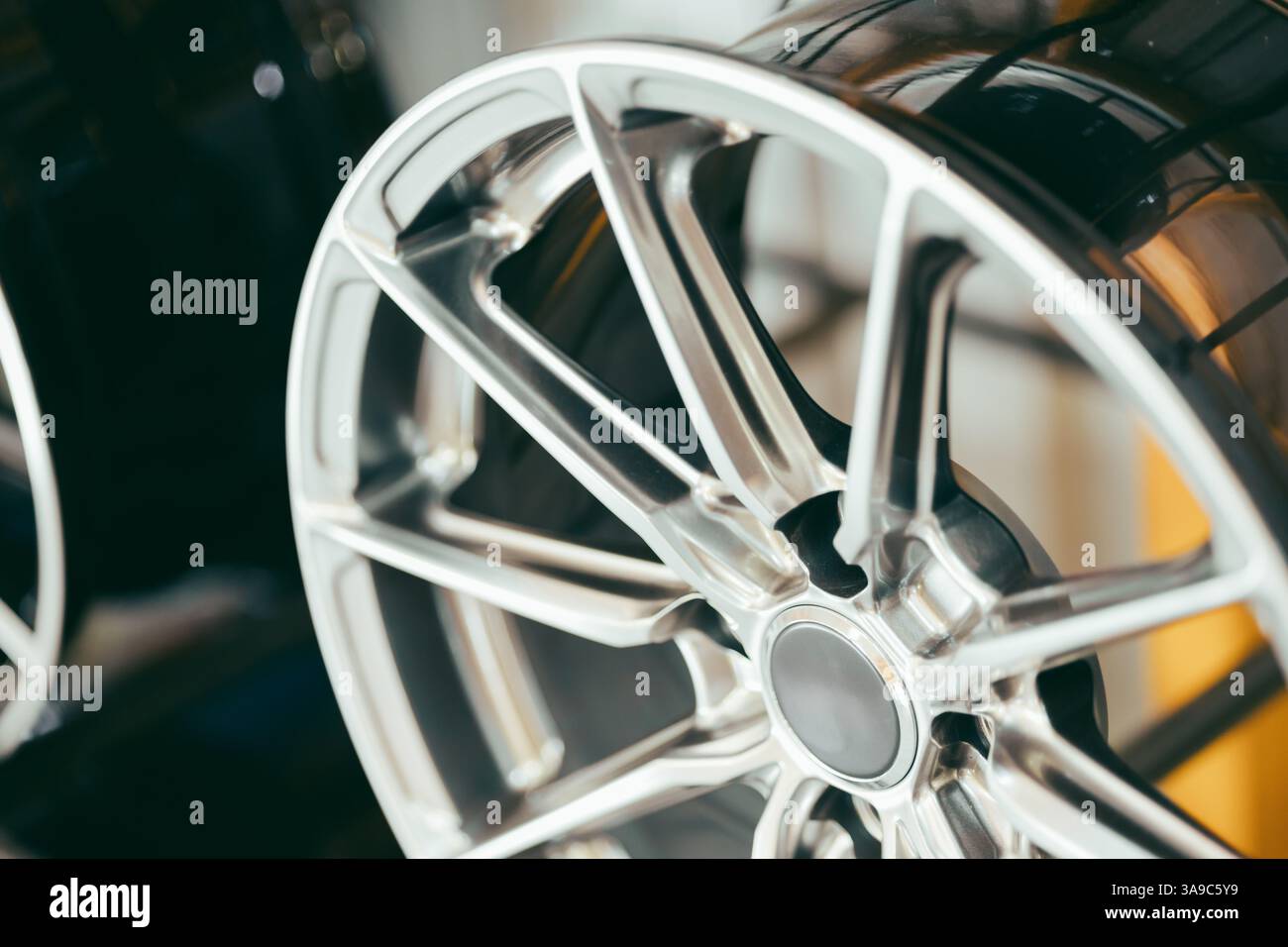 closeup car alloy mag wheels sport racing style in auto salon vehicle ...
