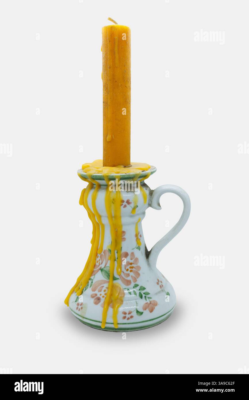 antique candle holder vintage style with handle and candle wax dripping ...