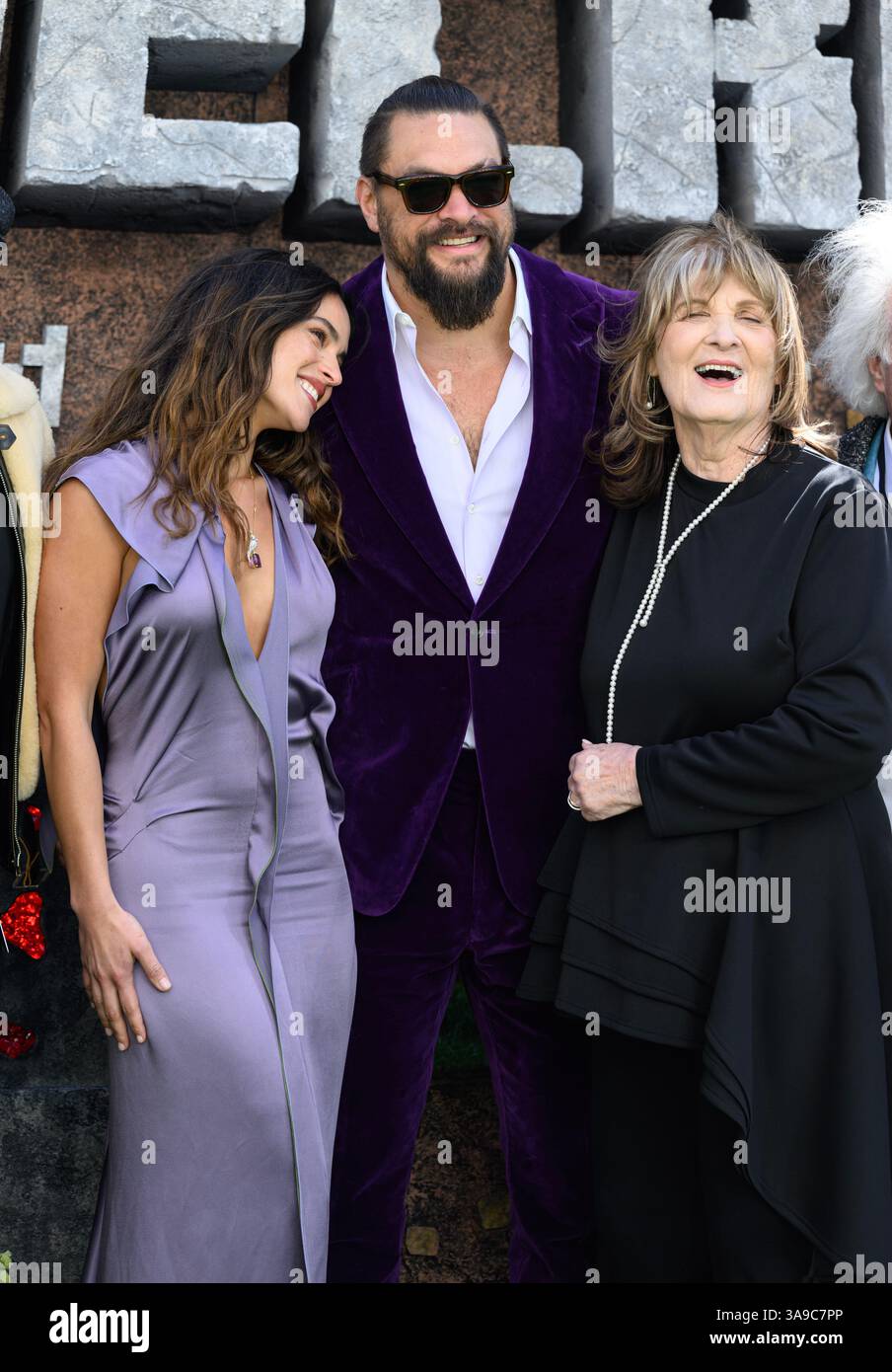London, UK. March 30th, 2025. Adria Arjona and Jason Momoa and mother ...