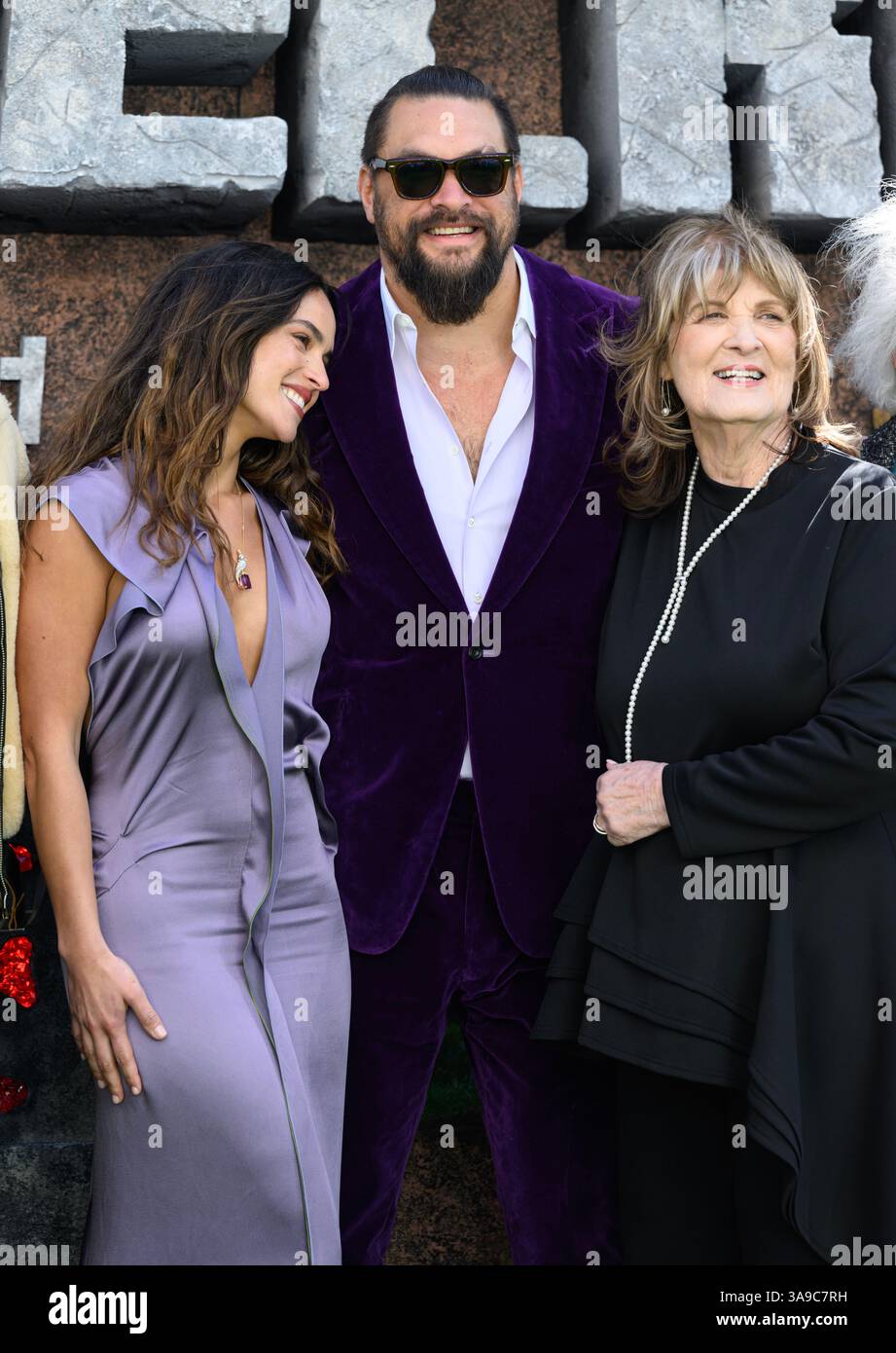 London, UK. March 30th, 2025. Adria Arjona and Jason Momoa and mother ...