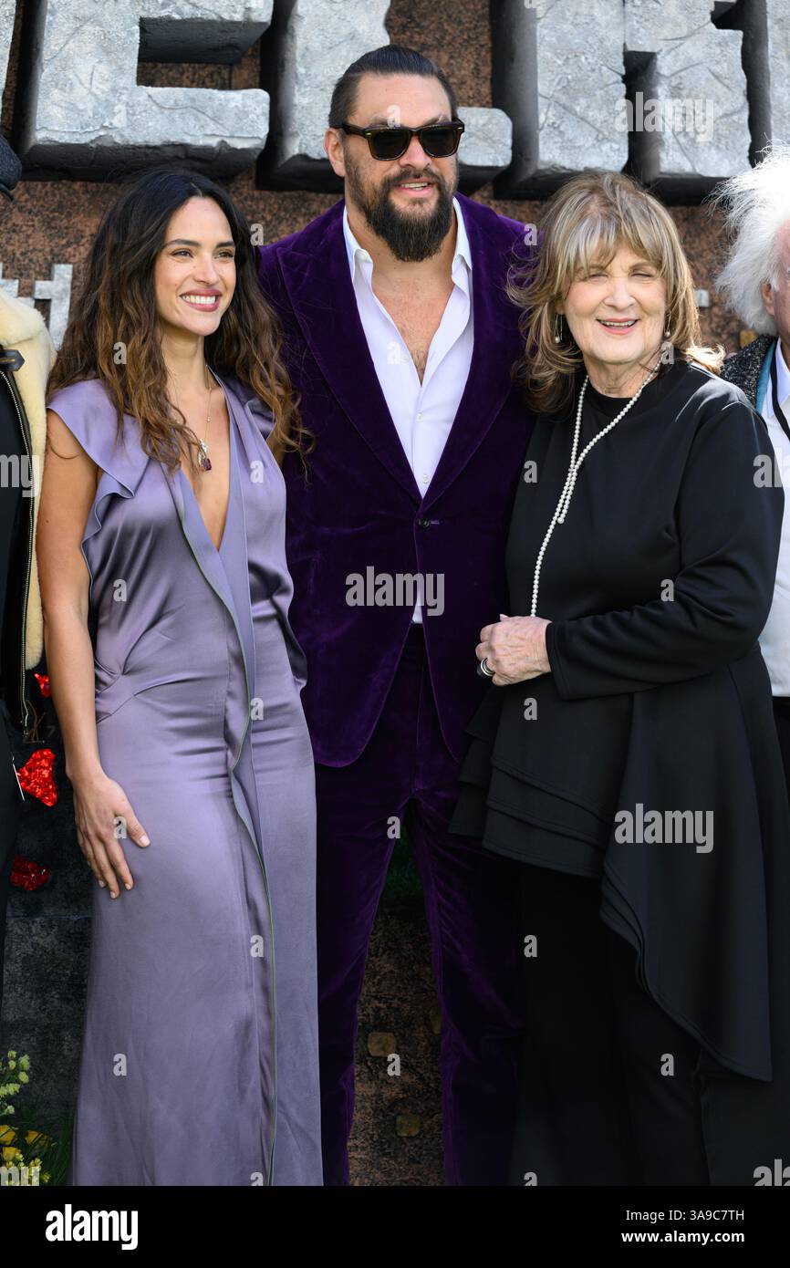 London, UK. March 30th, 2025. Adria Arjona and Jason Momoa and mother ...