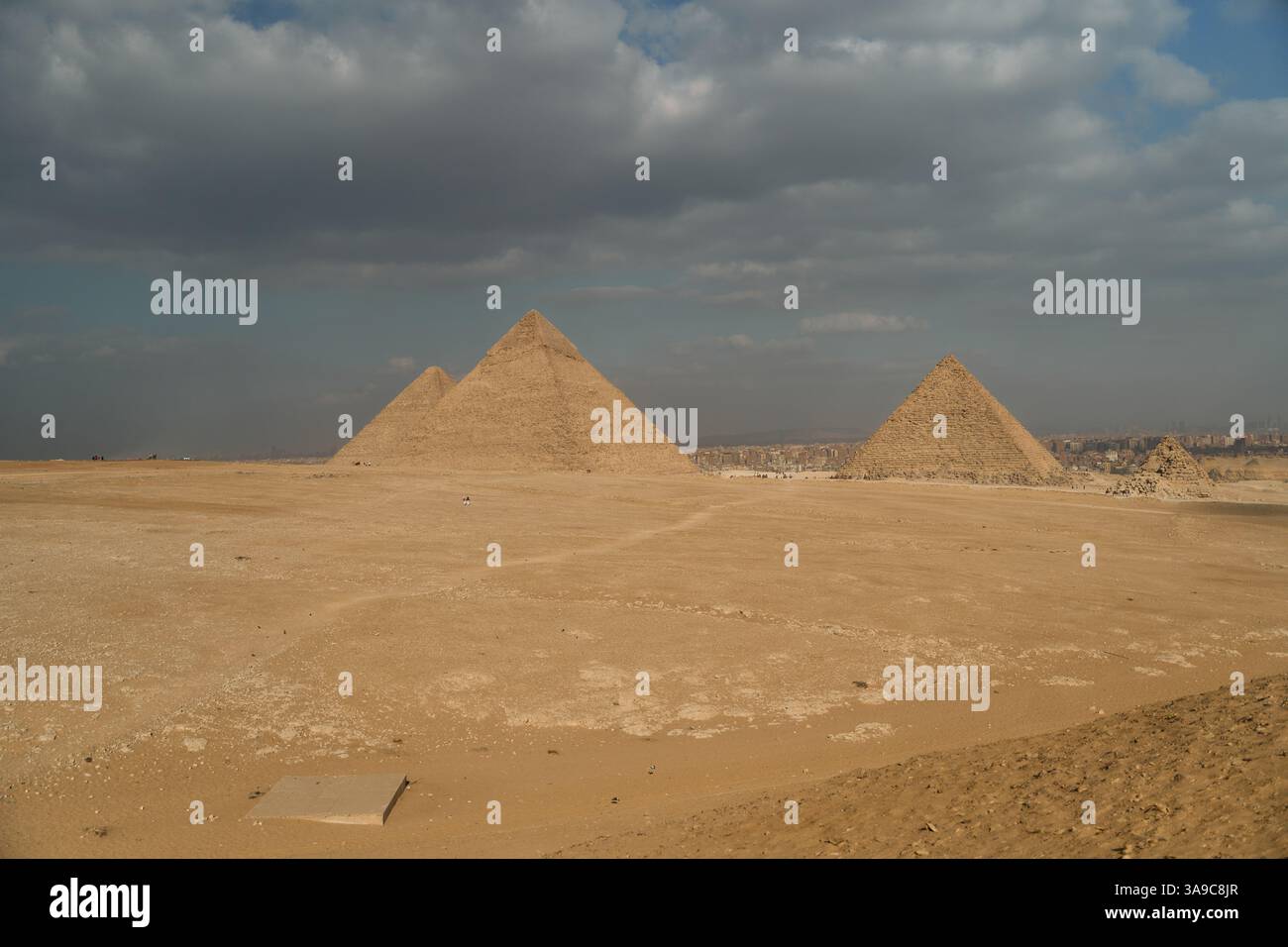 The Majestic Pyramids of Giza Stand Tall Against a Dramatic and ...
