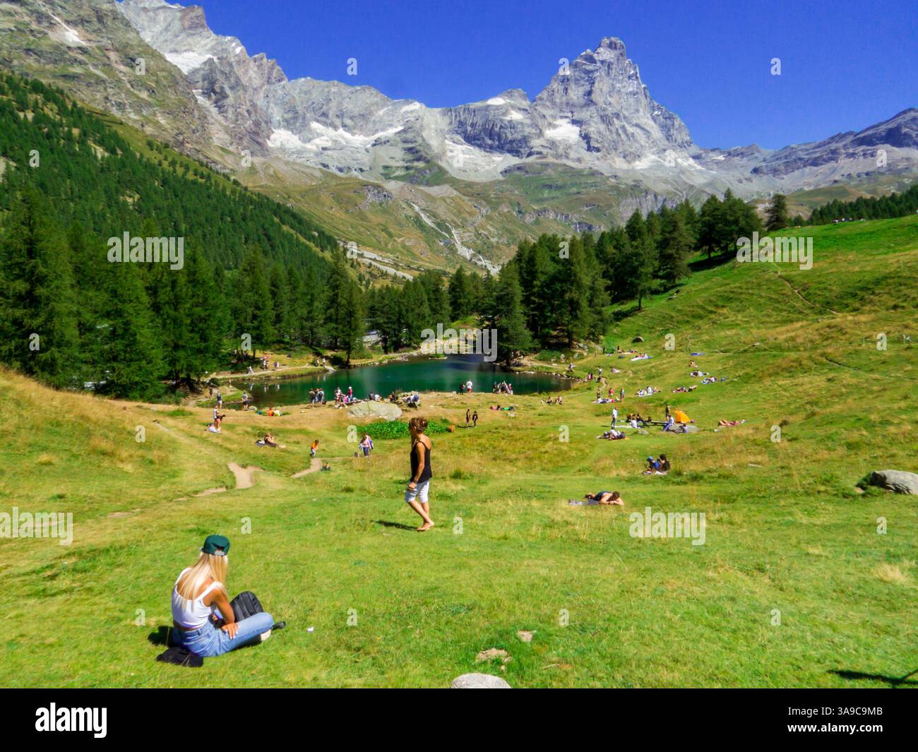 Cervinia, Italy - July 31, 2022: Tourists near the Blue Lake and the ...