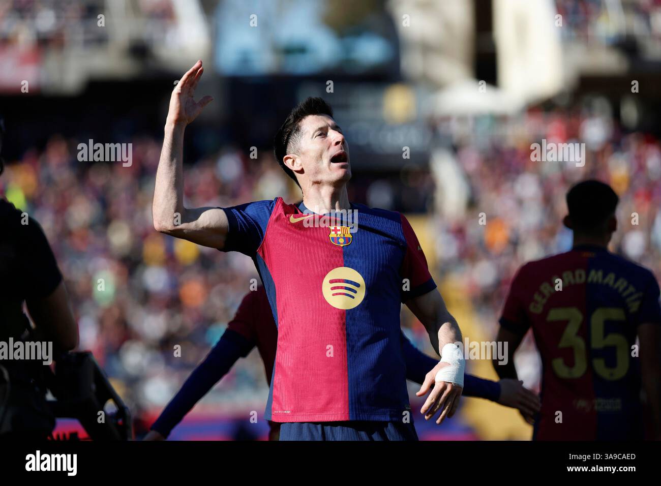 Barcelona's Robert Lewandowski celebrates after scoring during a ...