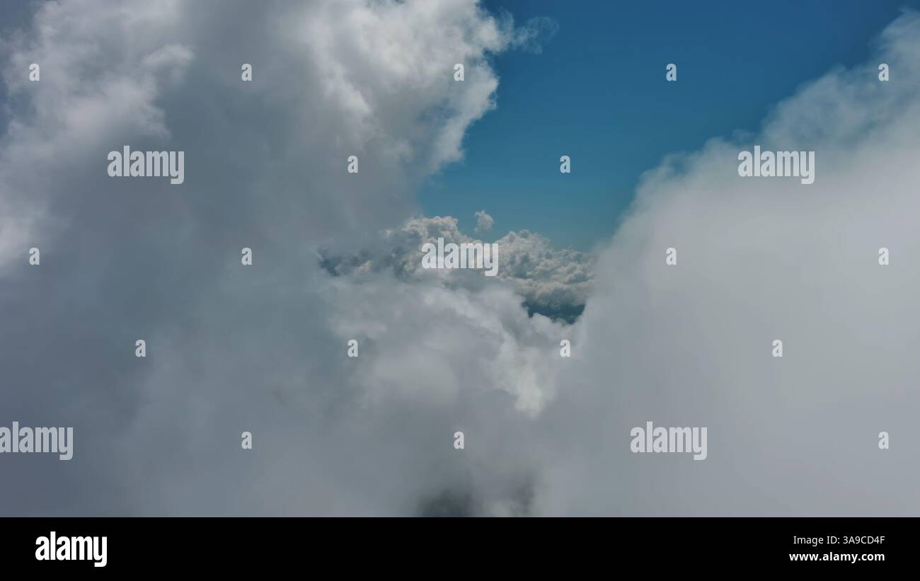 Clouds moving fast through white hi-res stock photography and images ...
