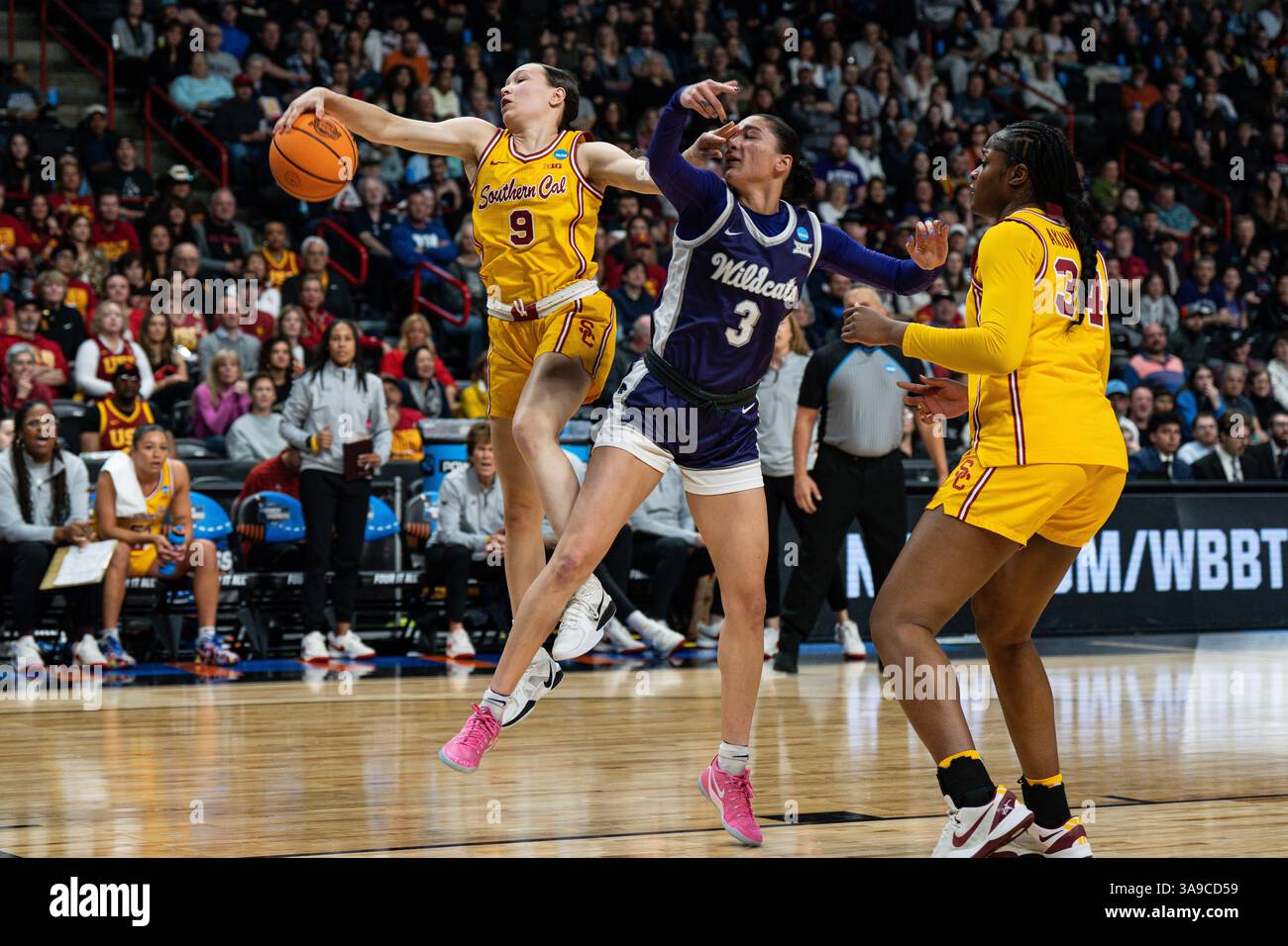 USC Trojans guard Kayleigh Heckel (9) grabs a rebound against Kansas ...