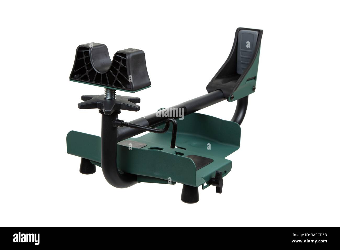 A green and black shooting rest designed for stabilizing firearms ...