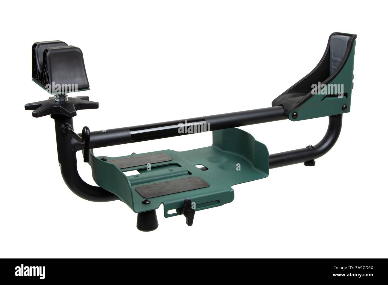 A green and black shooting rest designed for stabilizing firearms ...