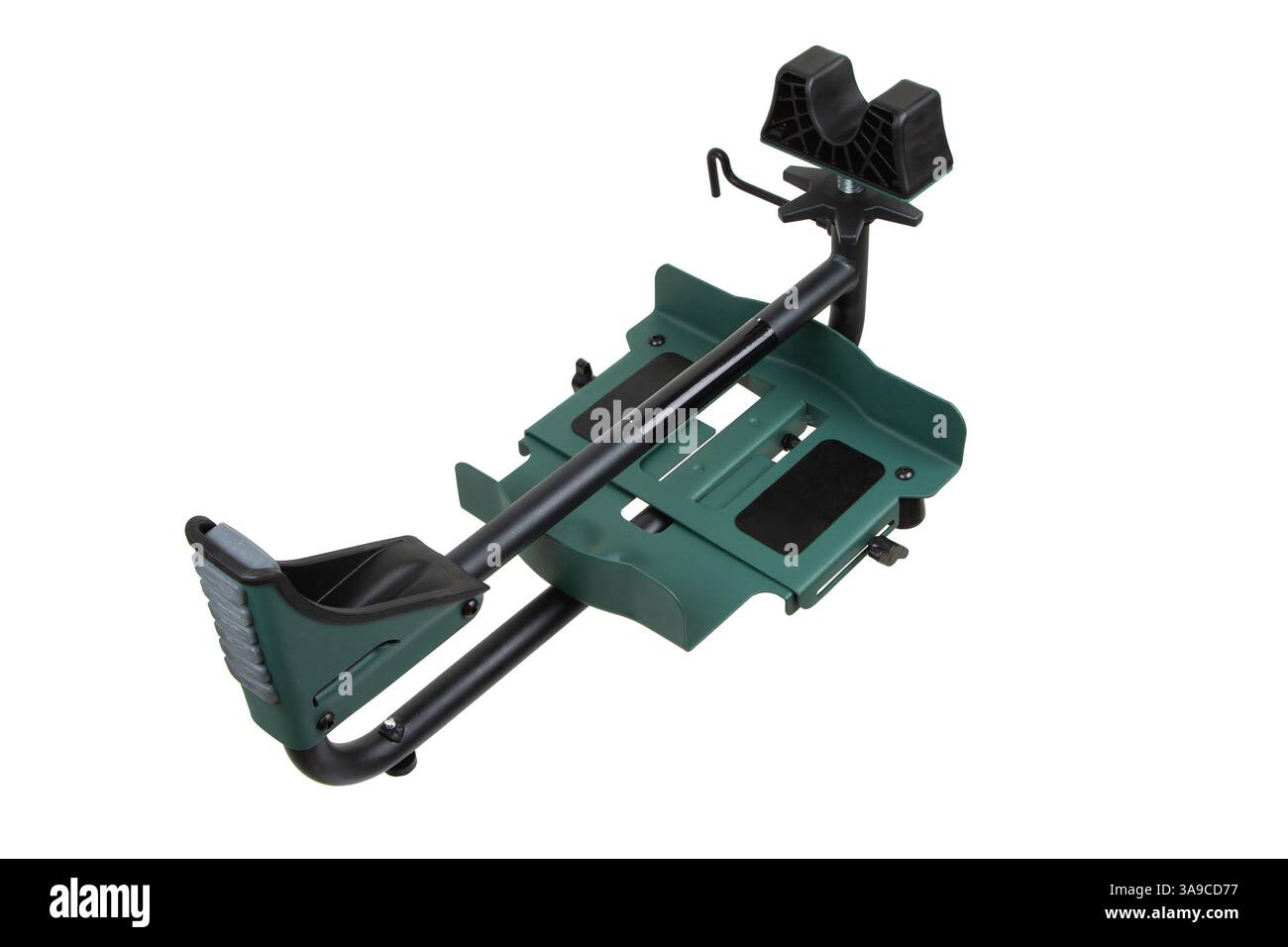 A green and black shooting rest designed for stabilizing firearms ...