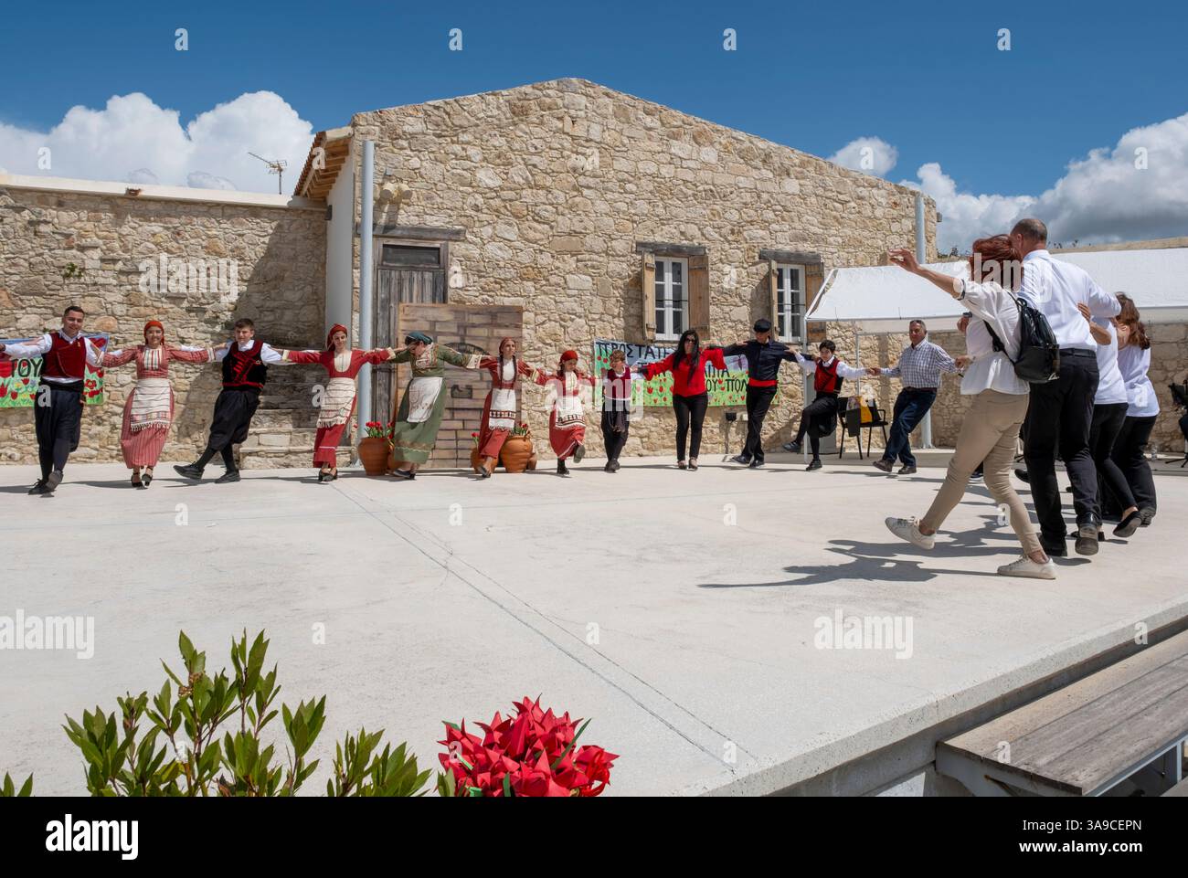 Folk dancers in traditional dress performing at the Polemi Tulip ...