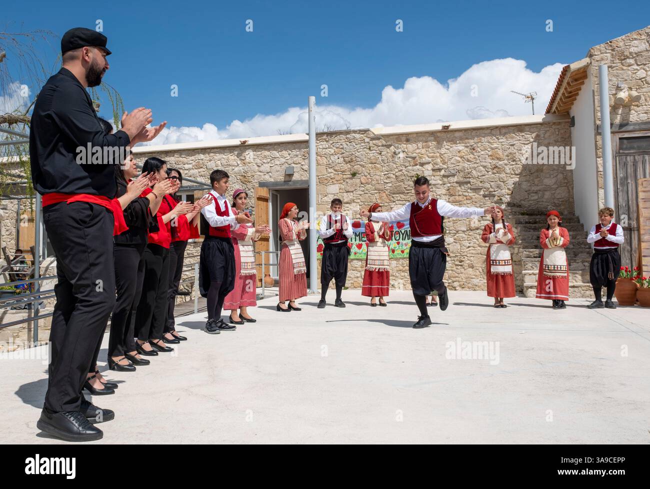 Folk dancers in traditional dress performing at the Polemi Tulip ...