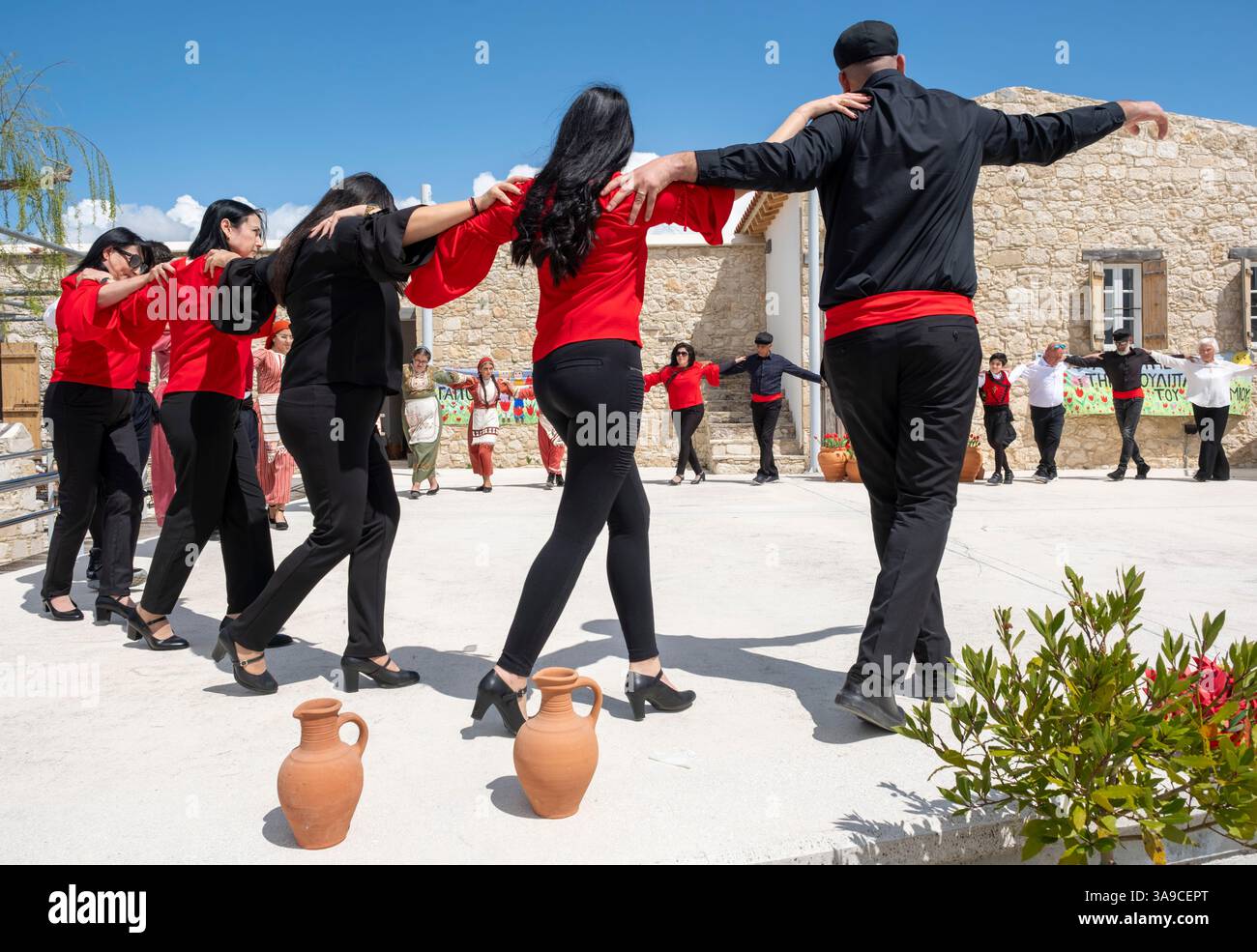 Folk dancers in traditional dress performing at the Polemi Tulip ...