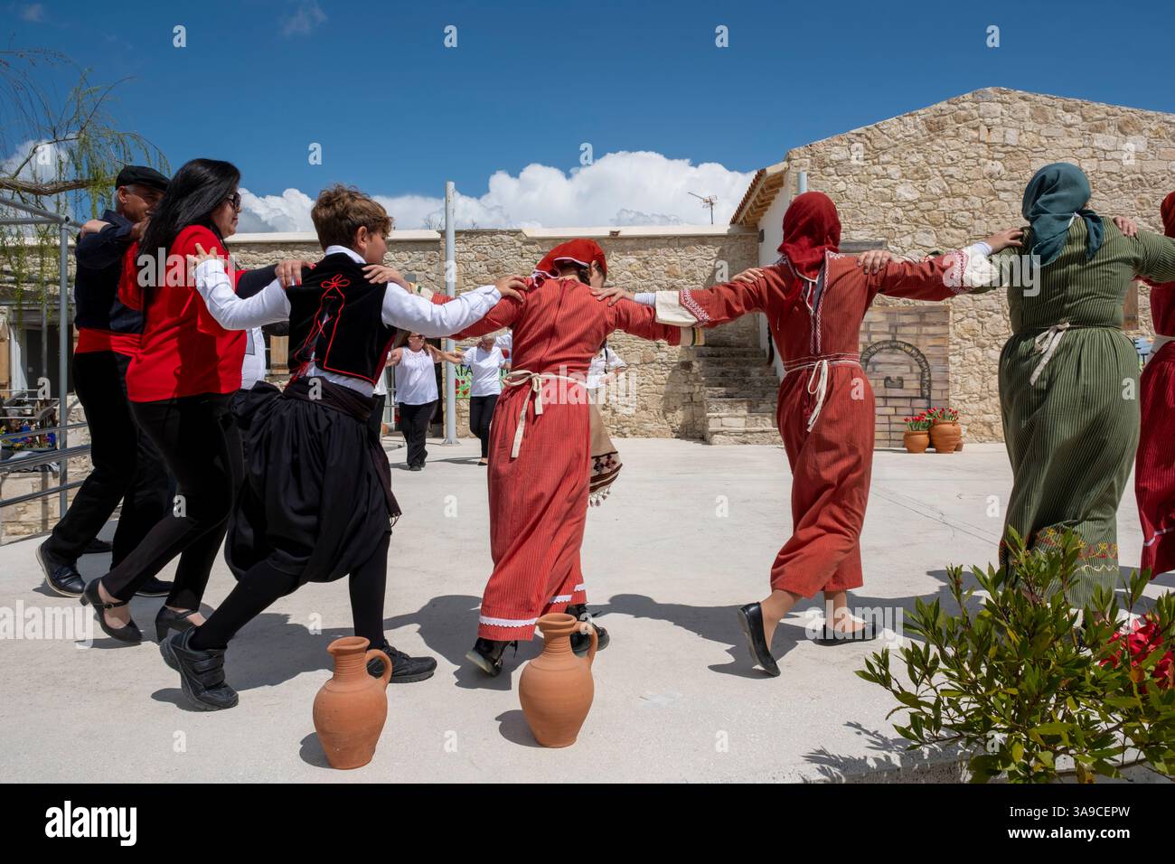 Folk dancers in traditional dress performing at the Polemi Tulip ...