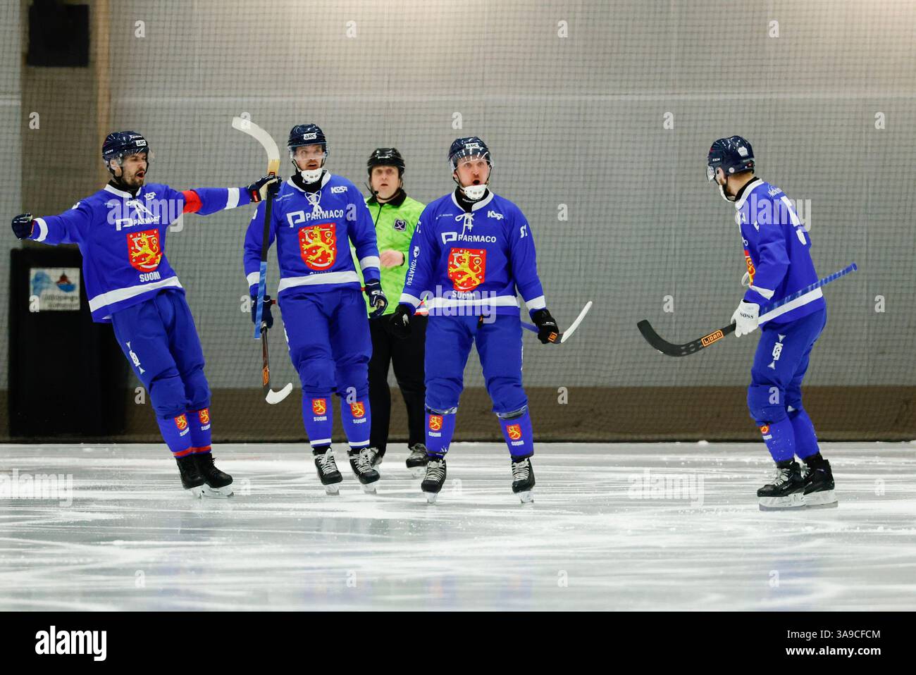 Finland's Emil Fedorov (second from right) celebrates with teammates ...