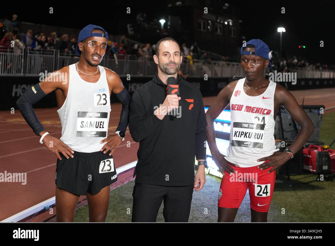 FloTrack general manager Ryan Fenton (center) interviews Tokyo 10,000m ...