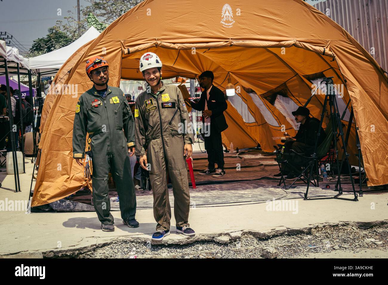 Bangkok, Thailand, March 29, 2025. Rescuers work at the site of a high ...