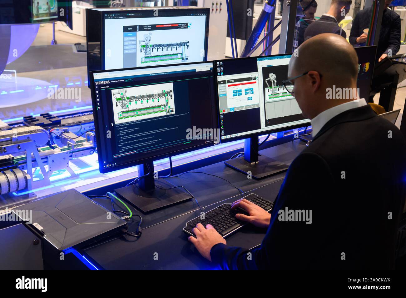 Hanover, Germany. 30th Mar, 2025. An employee operates a production ...