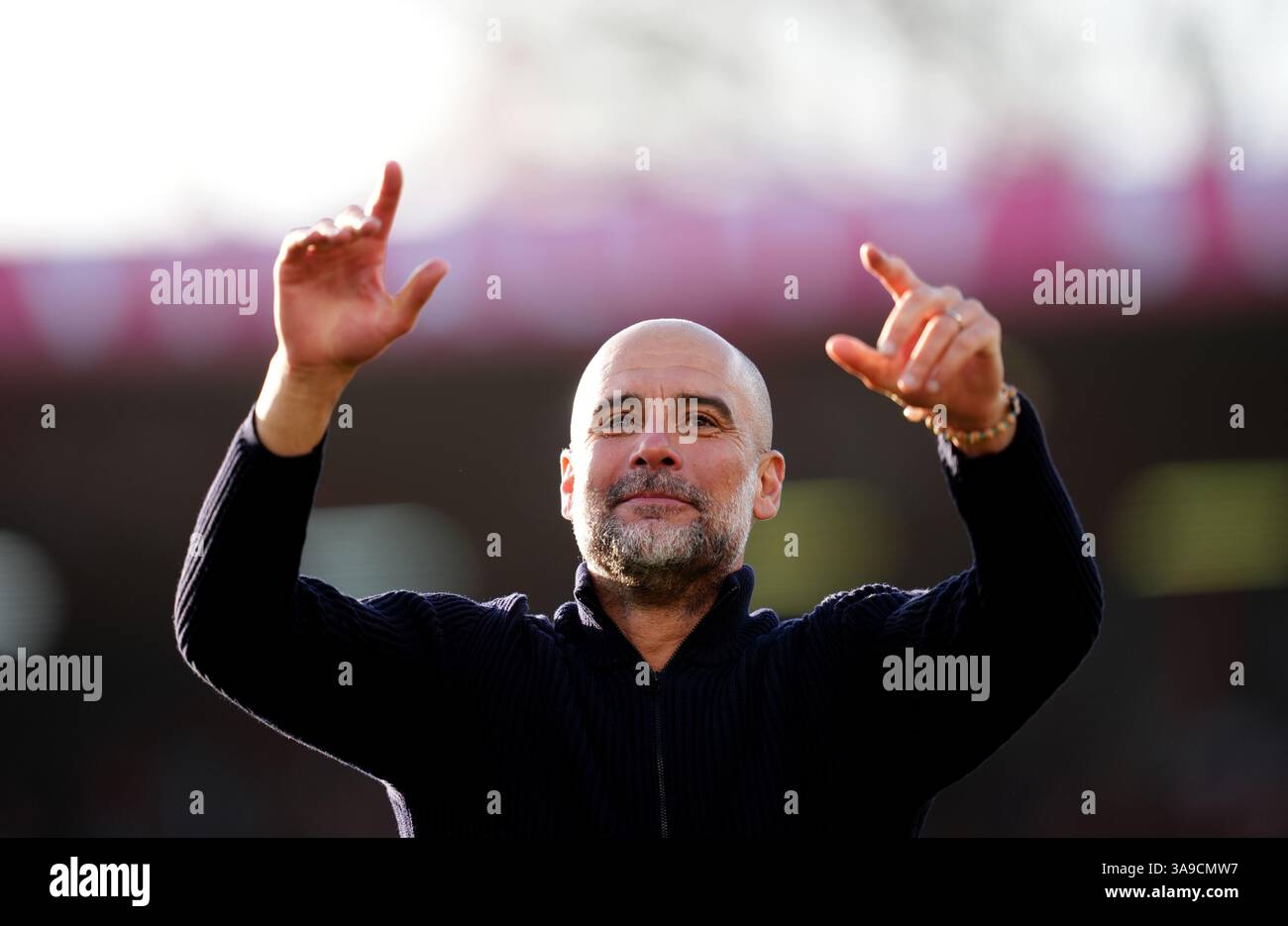 Manchester City manager Pep Guardiola celebrates following the Emirates ...