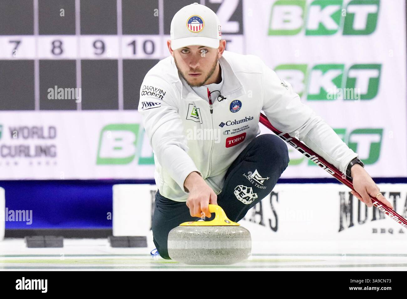 USA skip Korey Dropkin throws a stone during his country's session ...