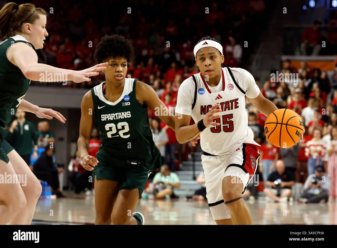 NC State's Zoe Brooks (35) controls the ball against Michigan State's ...