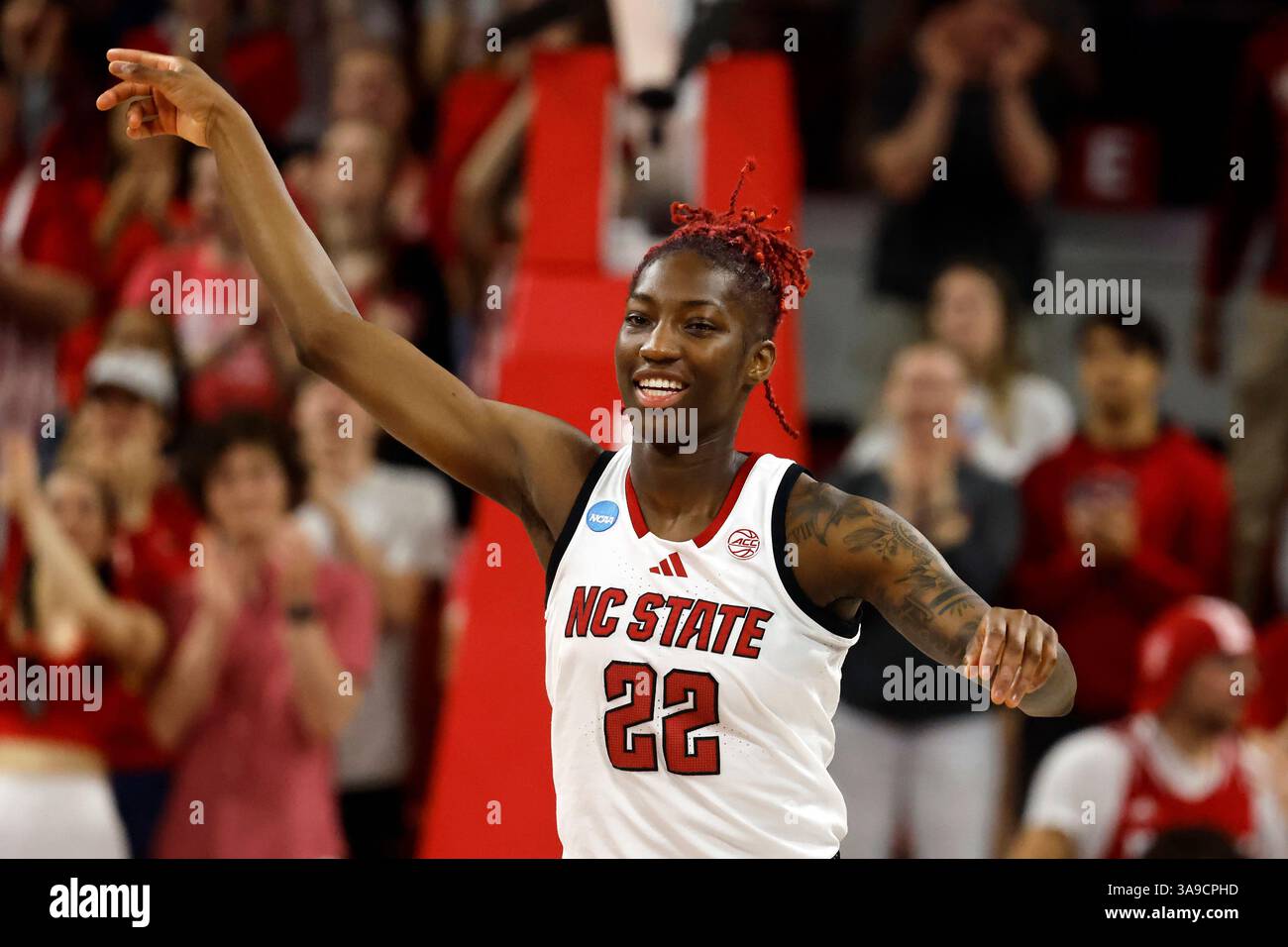 NC State's Saniya Rivers (22) celebrates a basket against Michigan ...
